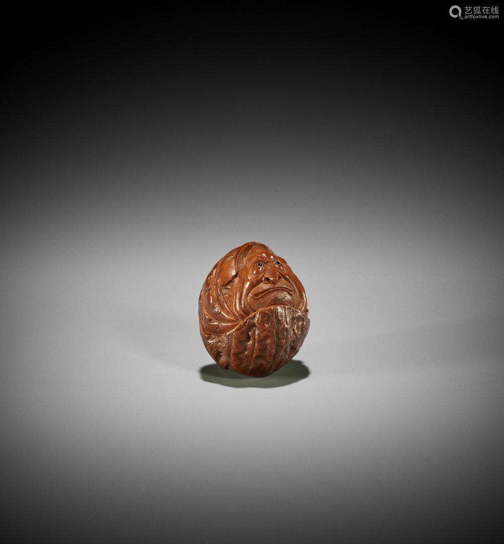 A KURUMI WALNUT NETSUKE OF A ROLY POLY DARUMA ATTRIBUTED Deal a-kurumi-walnut-netsuke-of-a-roly-poly-daruma-attributed-deal